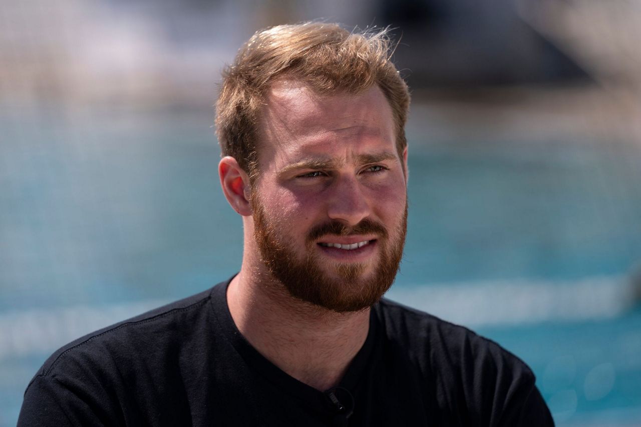 Vavic gets ready for Tokyo in water polo as dad awaits trial