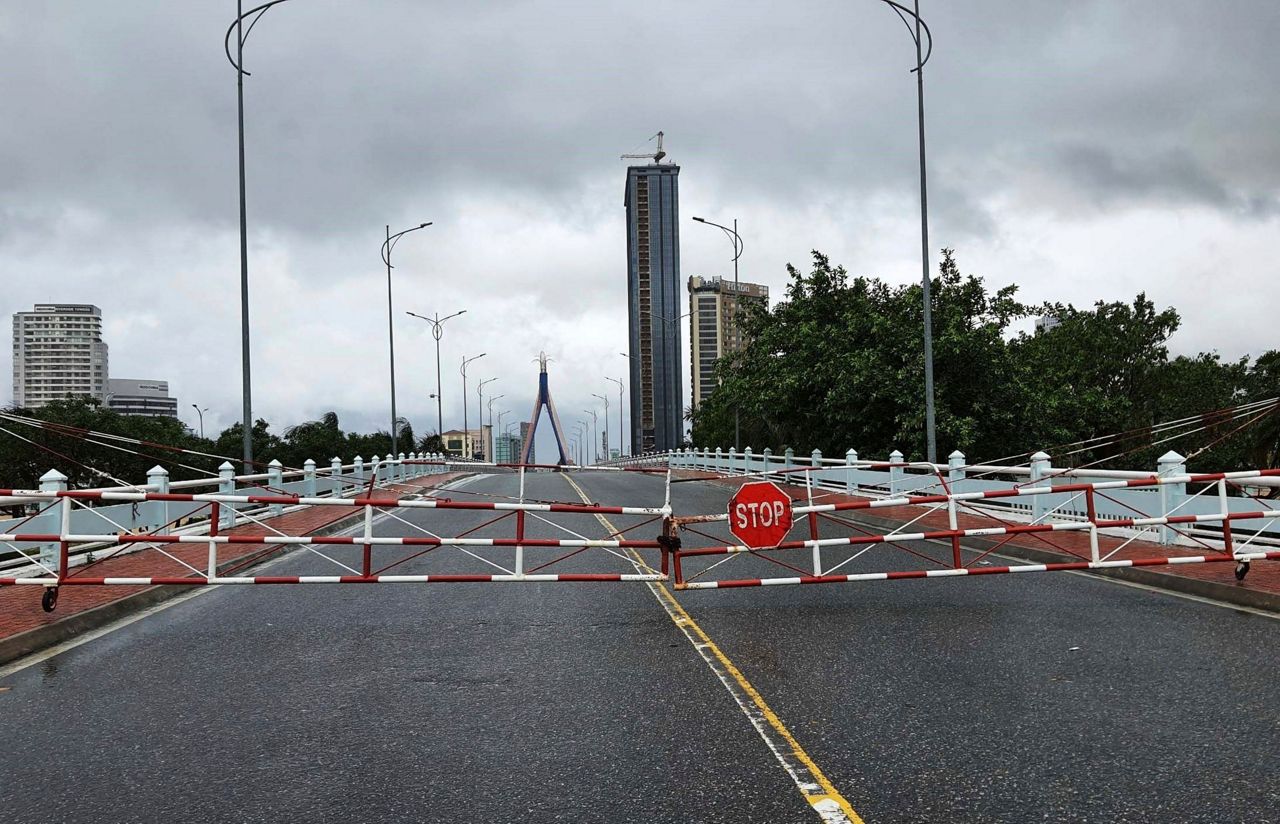 Strong typhoon leaves 1 dead, 12 missing as it nears Vietnam