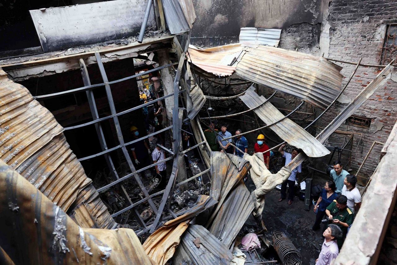 A fire in an apartment building in Hanoi, Vietnam, kills 14 people and ...