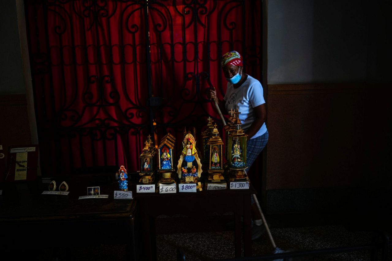 Virgin of Charity unites all Cubans — Catholics, Santeria followers ...