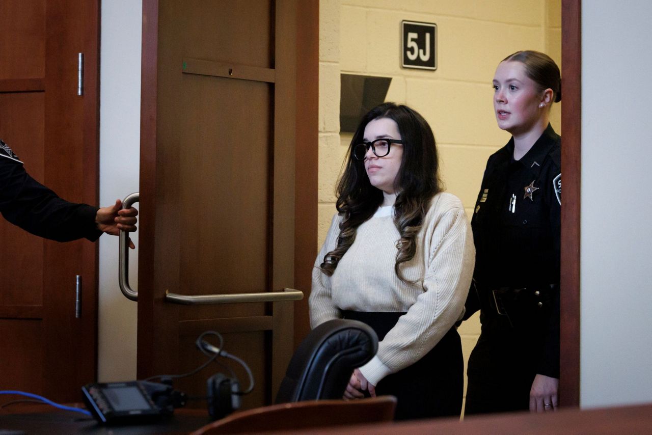 Husband testifies he did not plot wife's killing in double murder trial ...