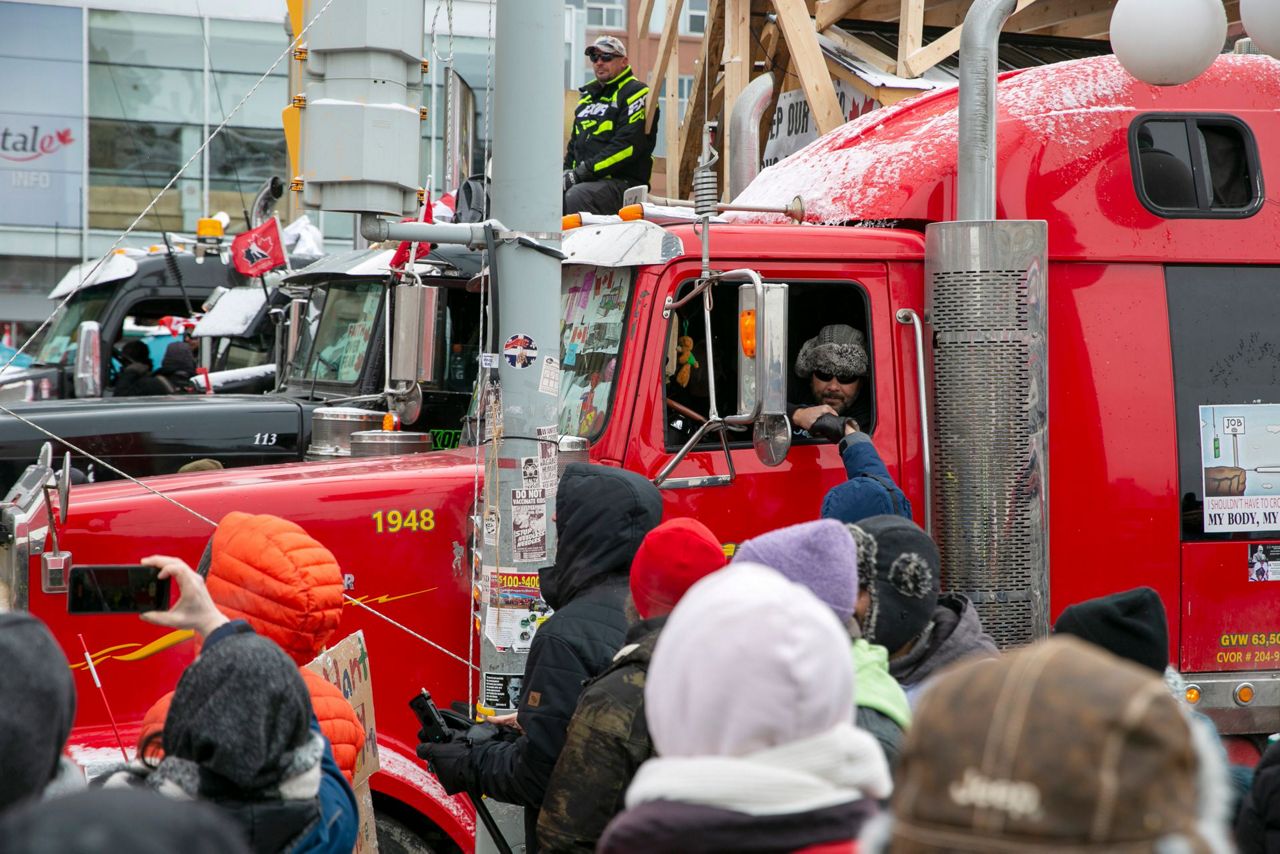 Key US-Canada bridge reopens as Ottawa protest persists