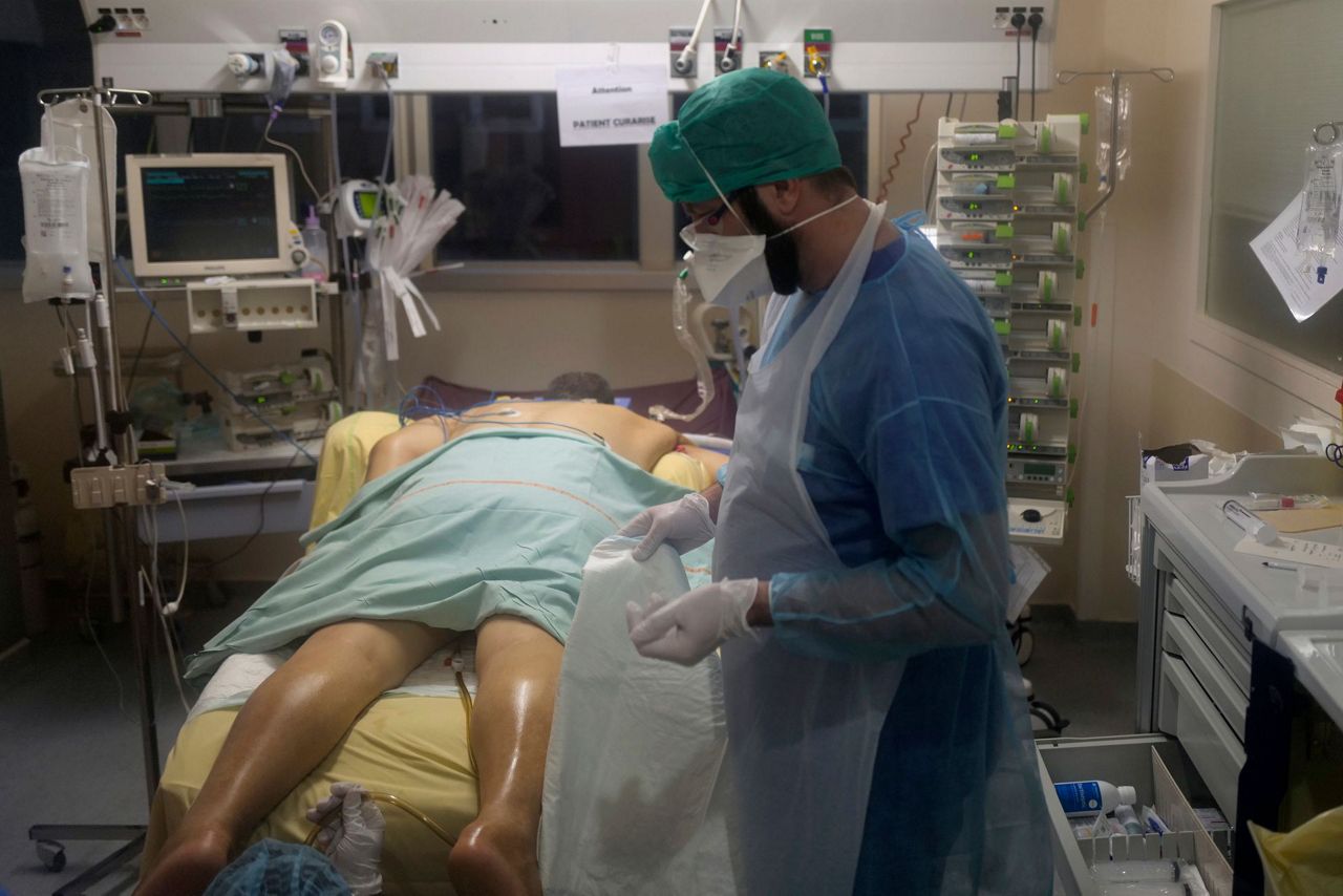 'Such is life': In virus wards, death is a foe but a fact