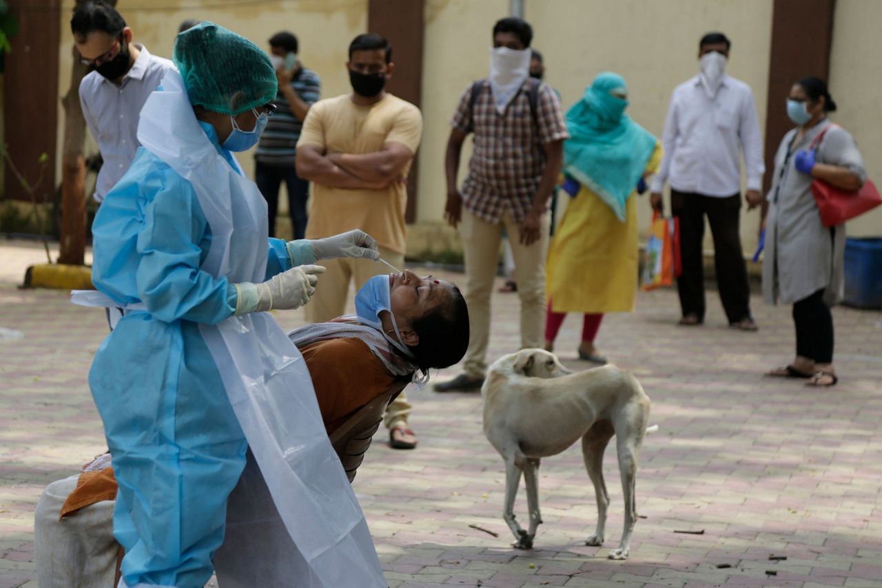 India virus cases surge nearly 32,700, beach state shut anew
