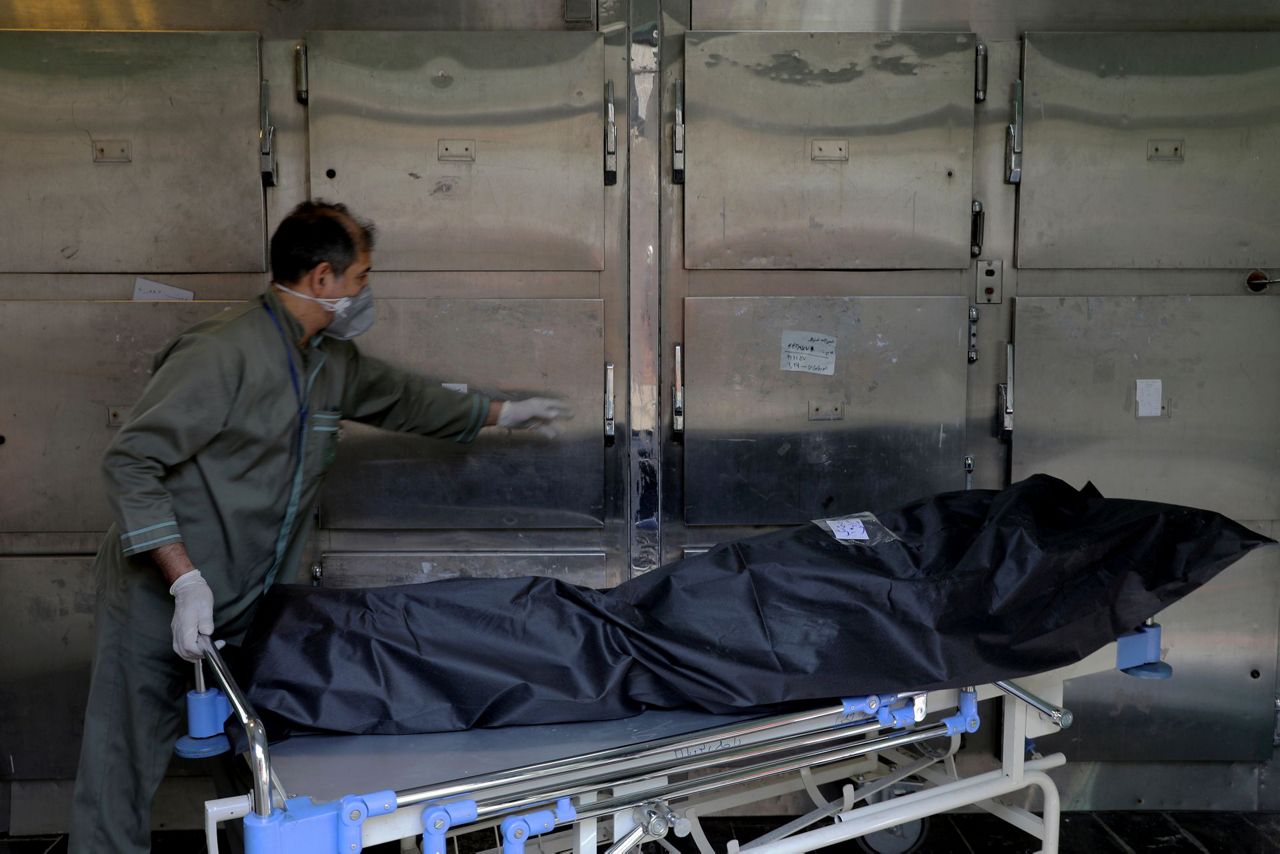 Sanctions-battered Iran, weary of pandemic, faces worst wave Sanctions-battered Iran, weary of pandemic, faces worst wave