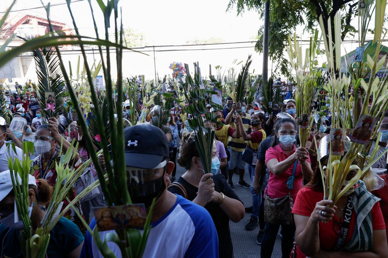 The Latest: No crowds at Holy Week ceremonies amid pandemic