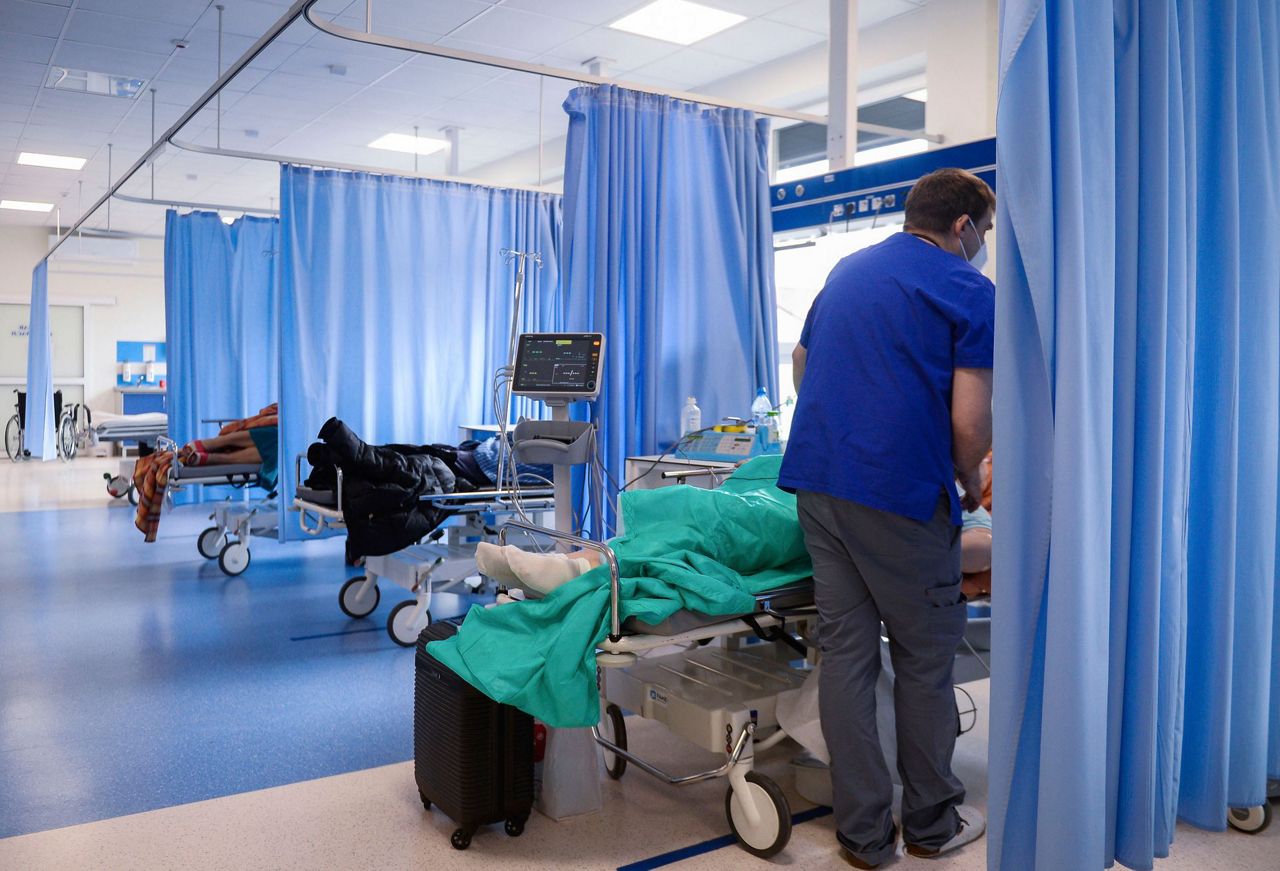 Polish hospitals struggle with surge of virus patients