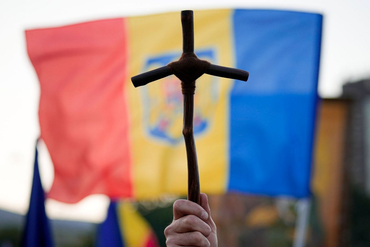 Protesters in Romania reject coronavirus restrictions