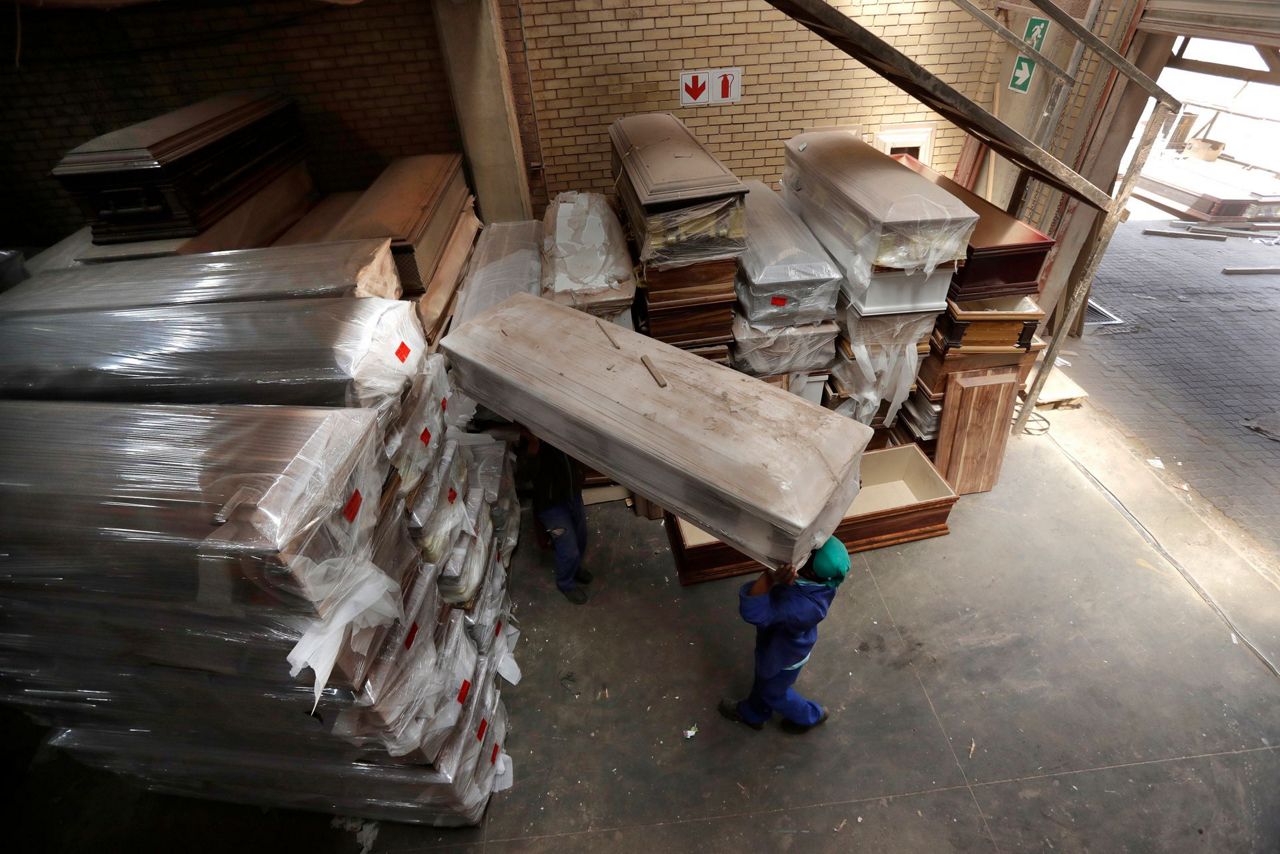 South African coffin-maker saw COVID-19 at work and at home