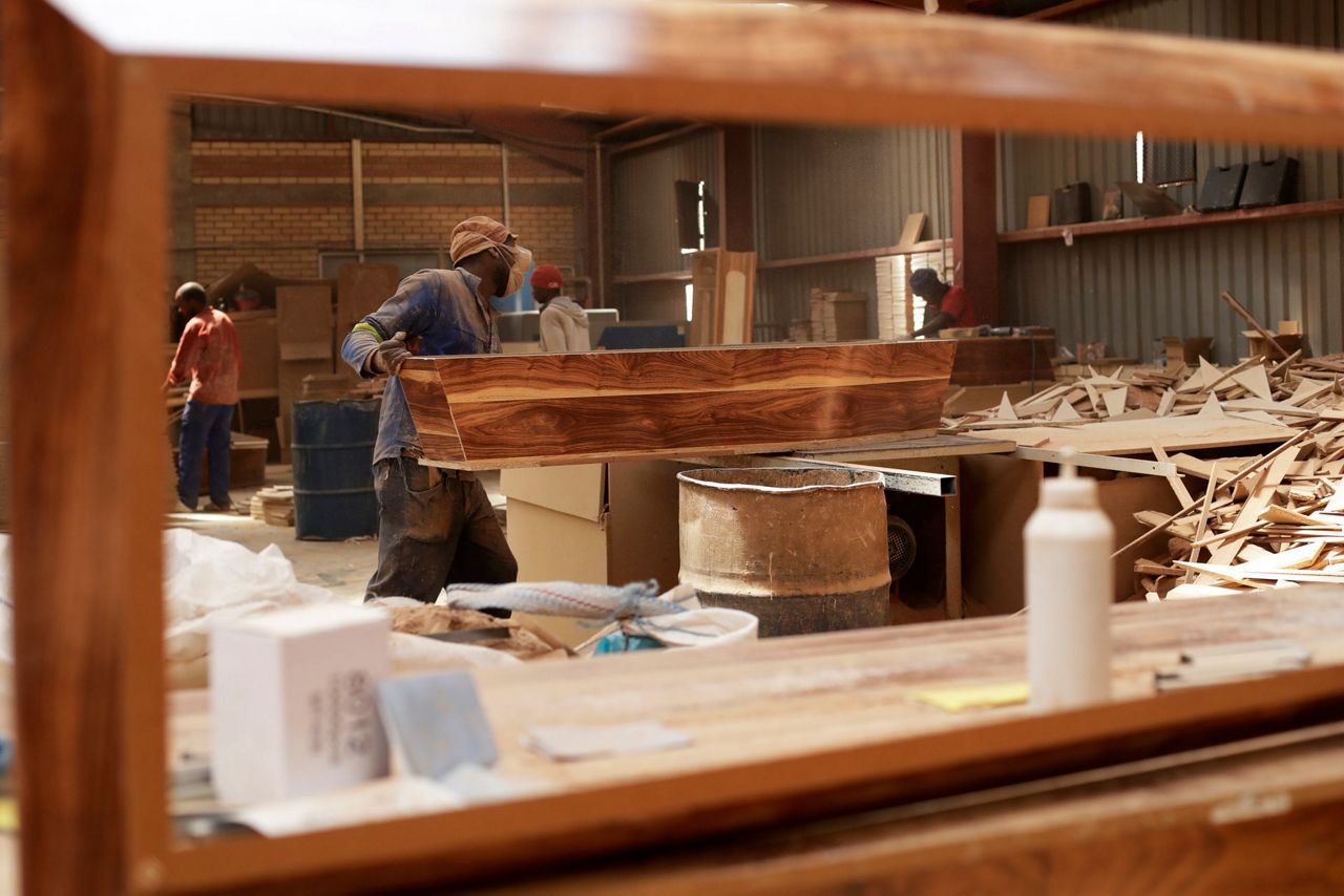 South African coffin-maker saw COVID-19 at work and at home