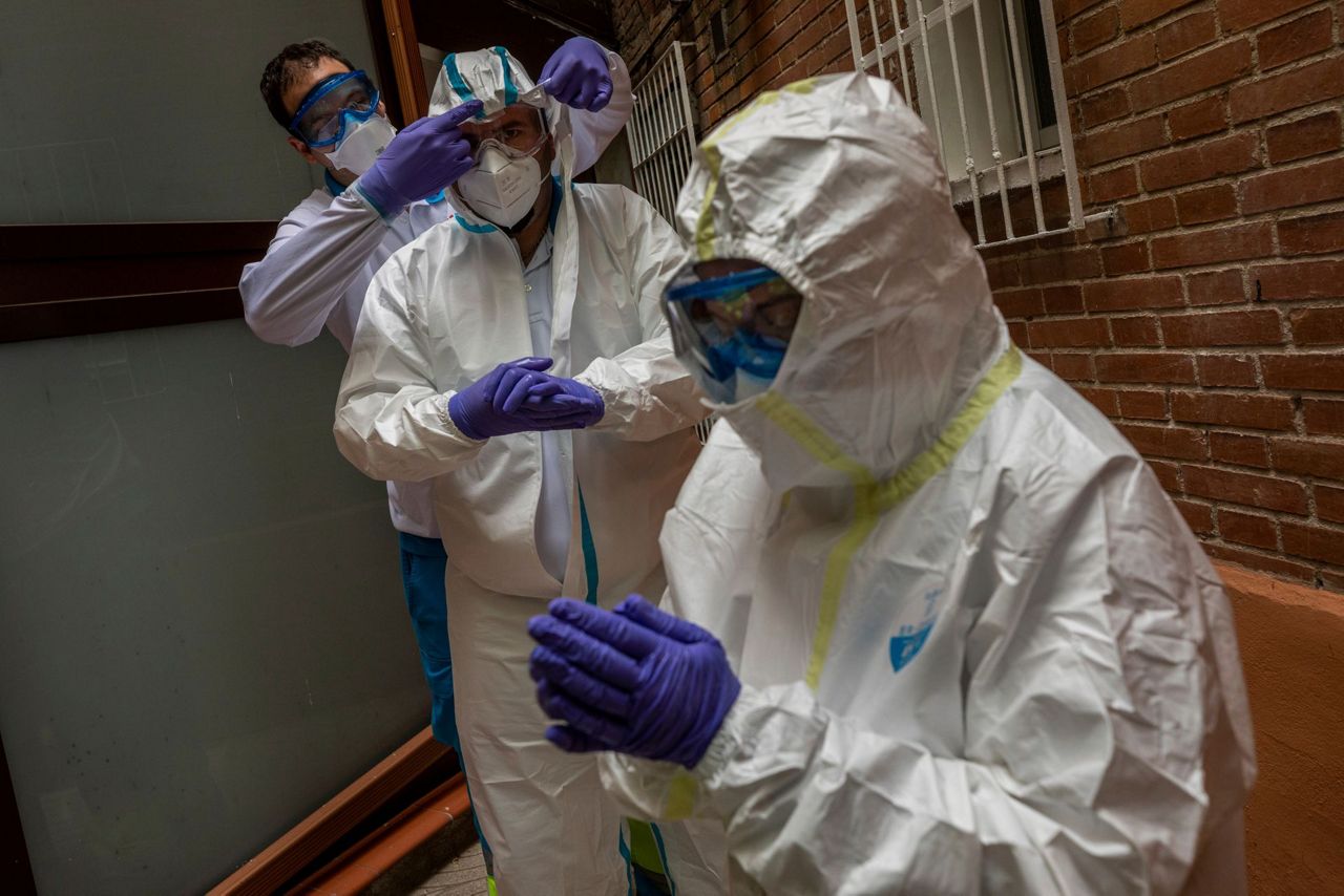 AP PHOTOS: Spanish ambulance workers fear virus rebound