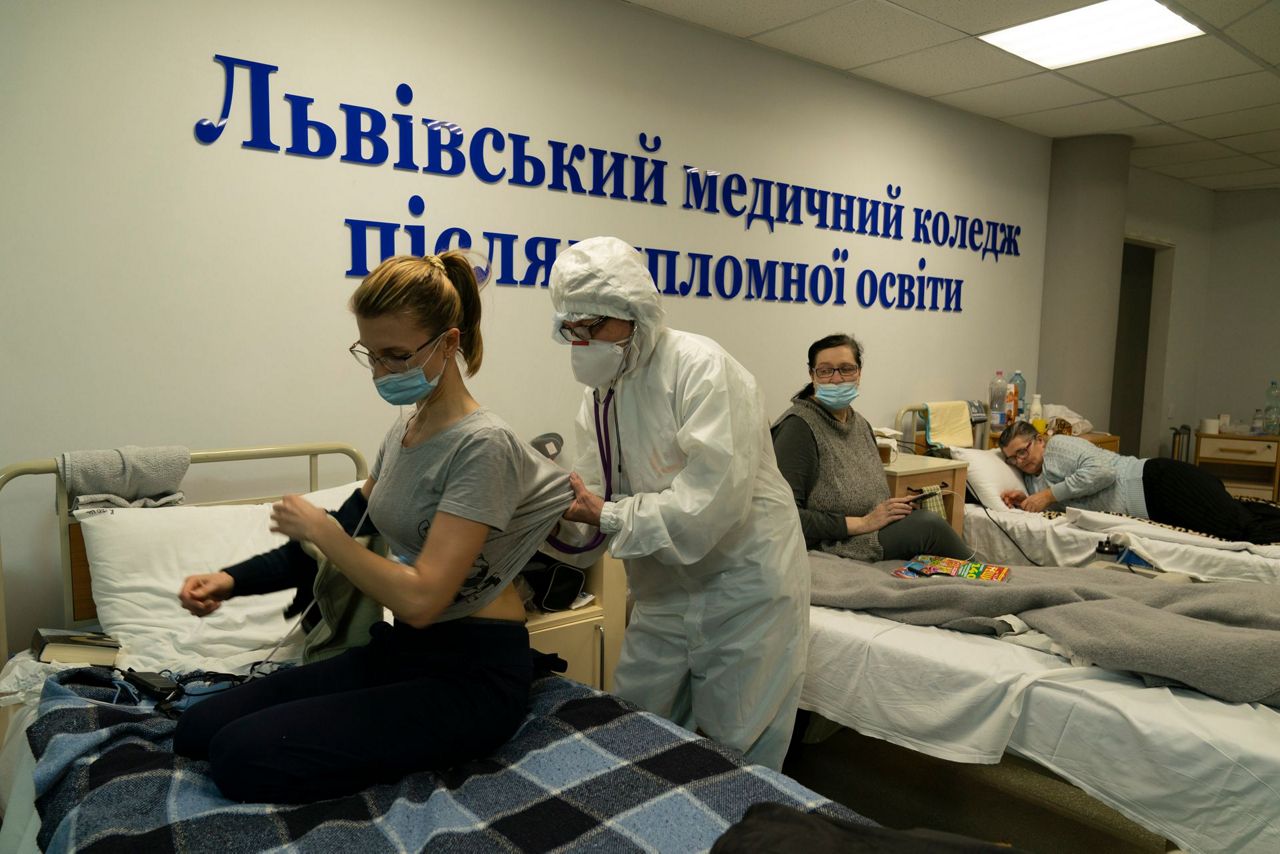 AP PHOTOS: Ukraine's hospitals grapple with COVID-19 surge