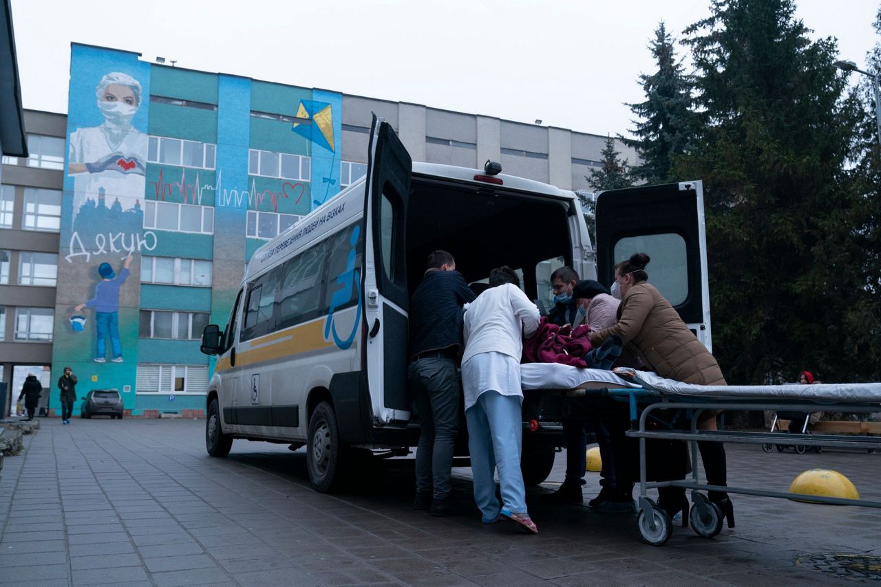 AP PHOTOS: Ukraine's hospitals grapple with COVID-19 surge