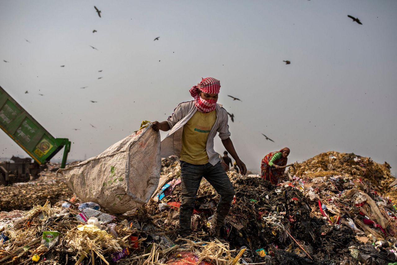Trash scavengers who help keep cities clean plea for vaccine