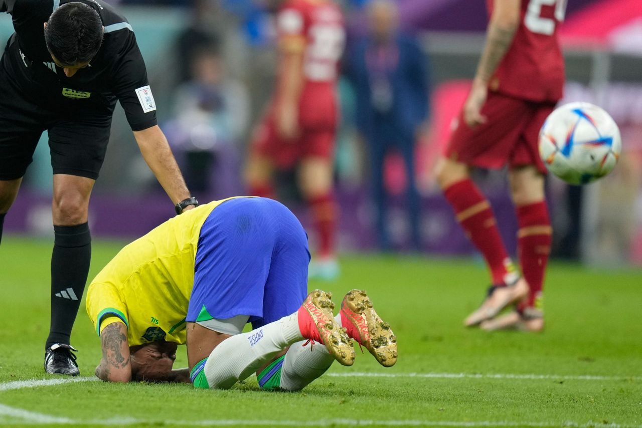 Crying Neymar injures ankle during Brazil's World Cup win
