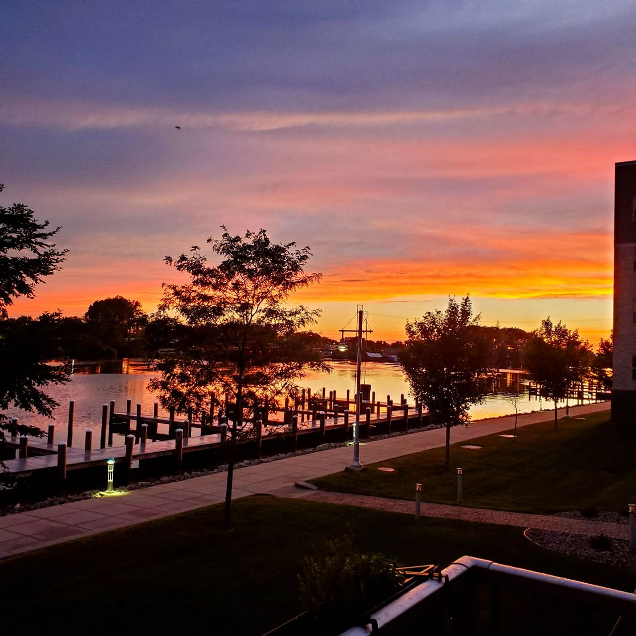 Why do we see vibrant colors at sunrise and sunset?