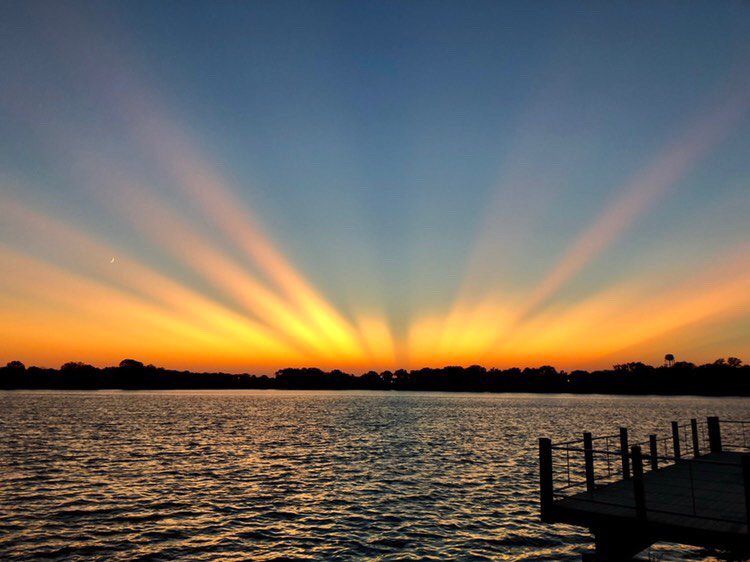 Why do we see vibrant colors at sunrise and sunset?