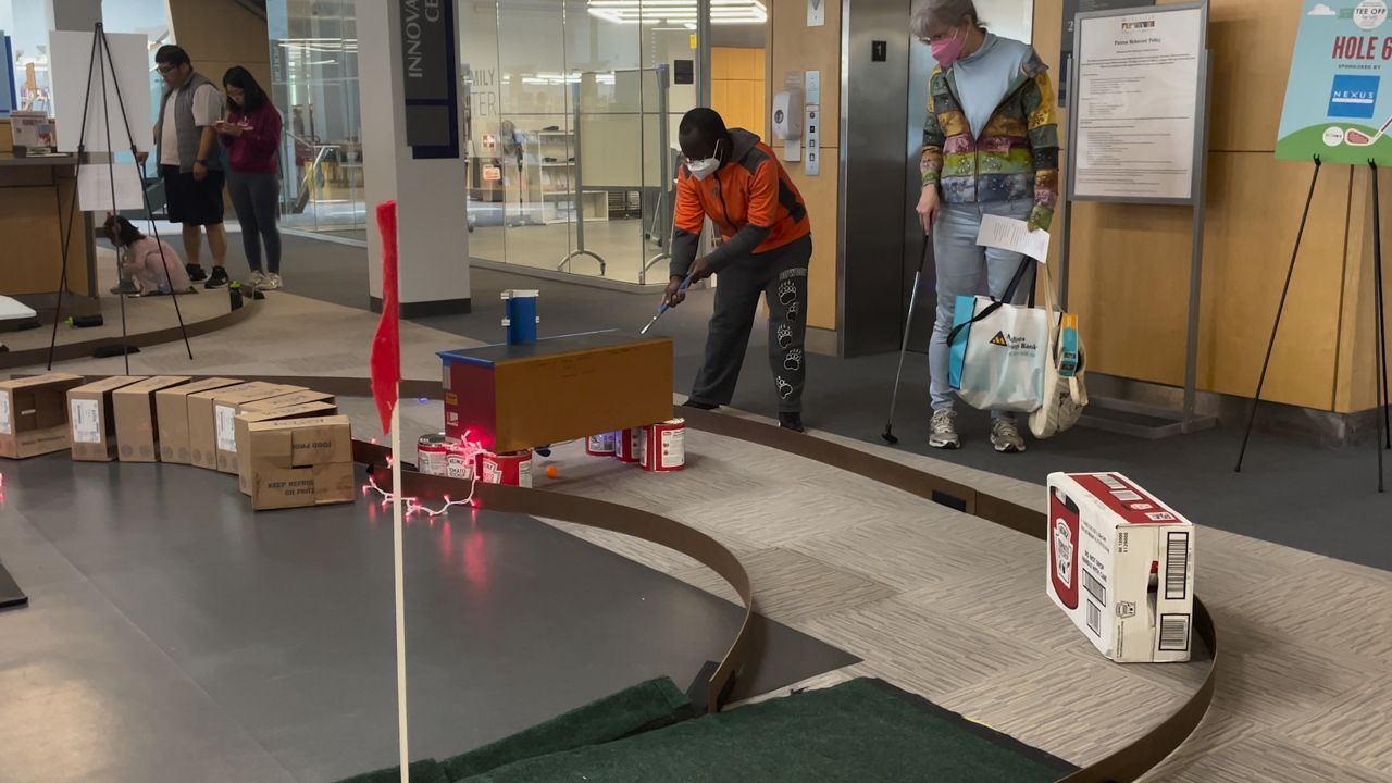 Worcester Public Library holds mini golf event