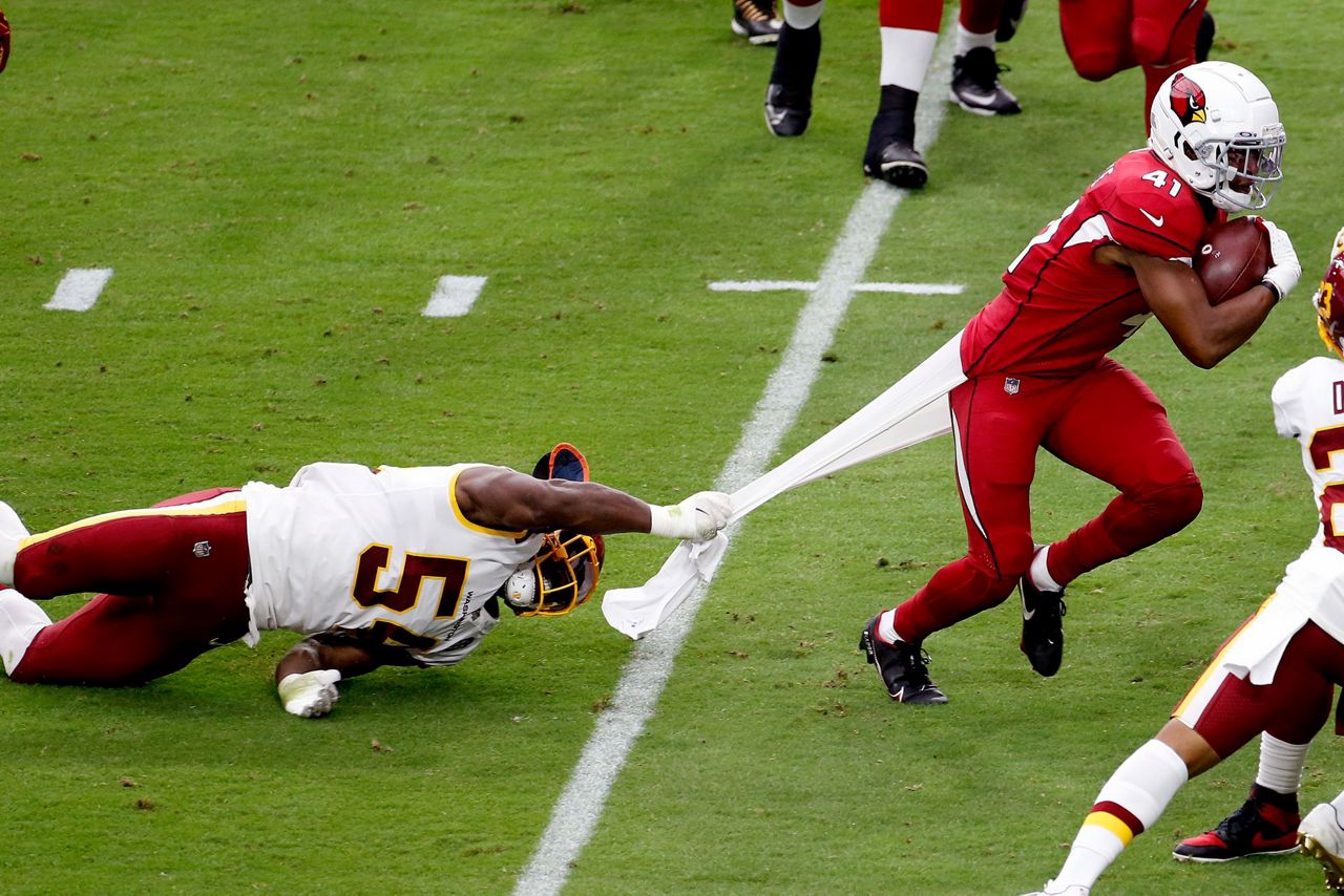 Murray runs for 2 TDs, Cardinals roll past Washington 30-15