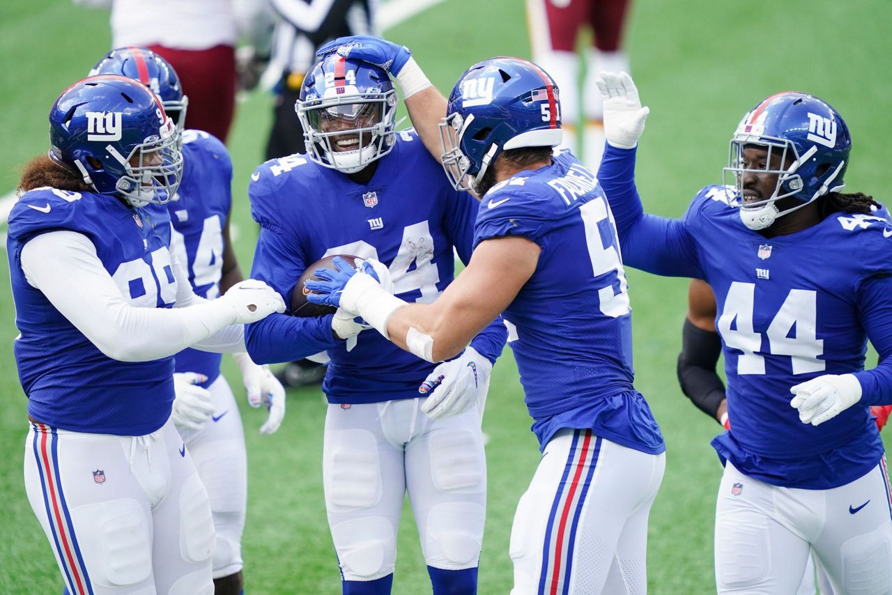 Giants and Judge finally win, beat Washington on fumble TD