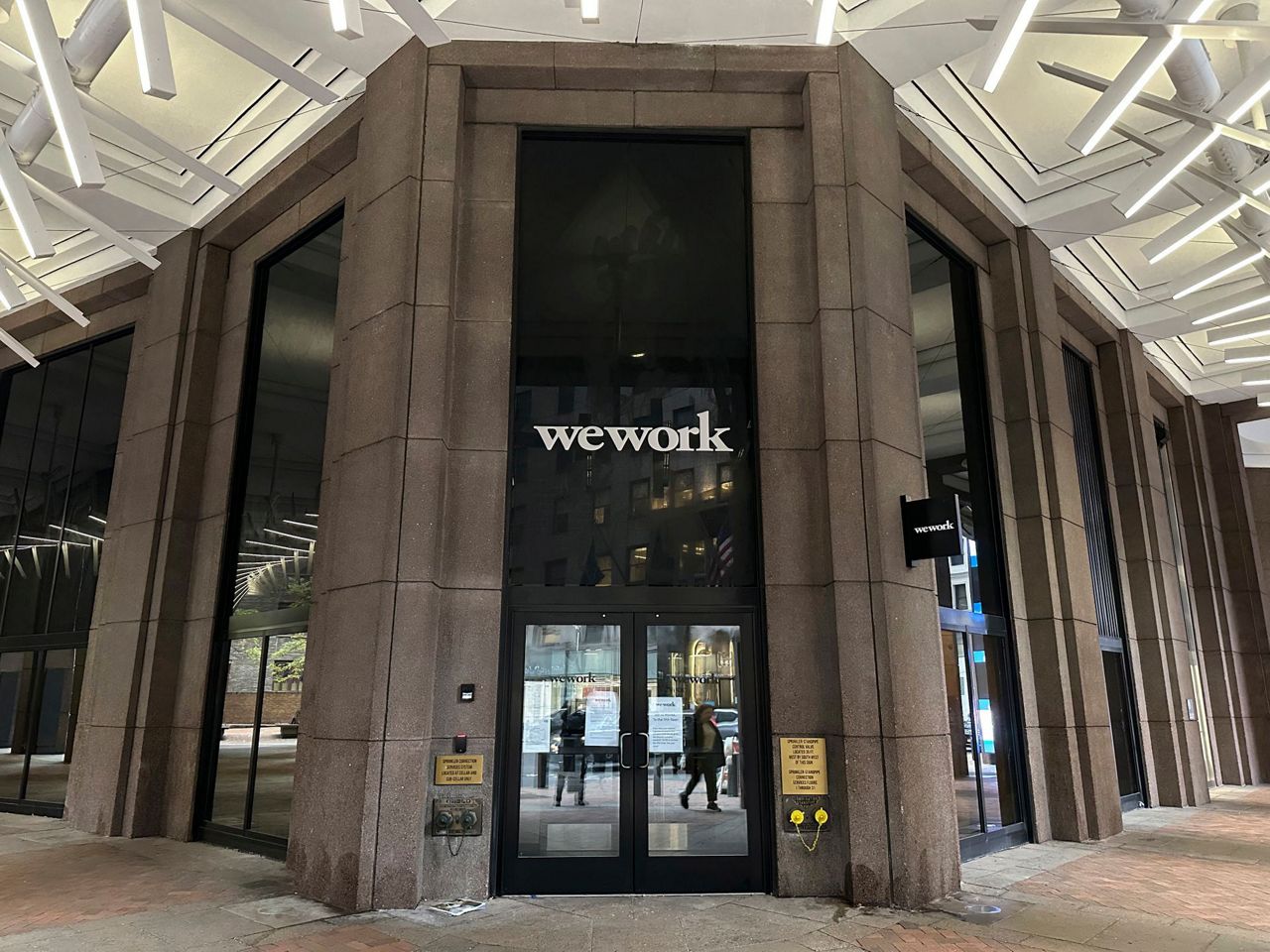 WeWork seeks bankruptcy protection, a stunning fall for a firm once ...