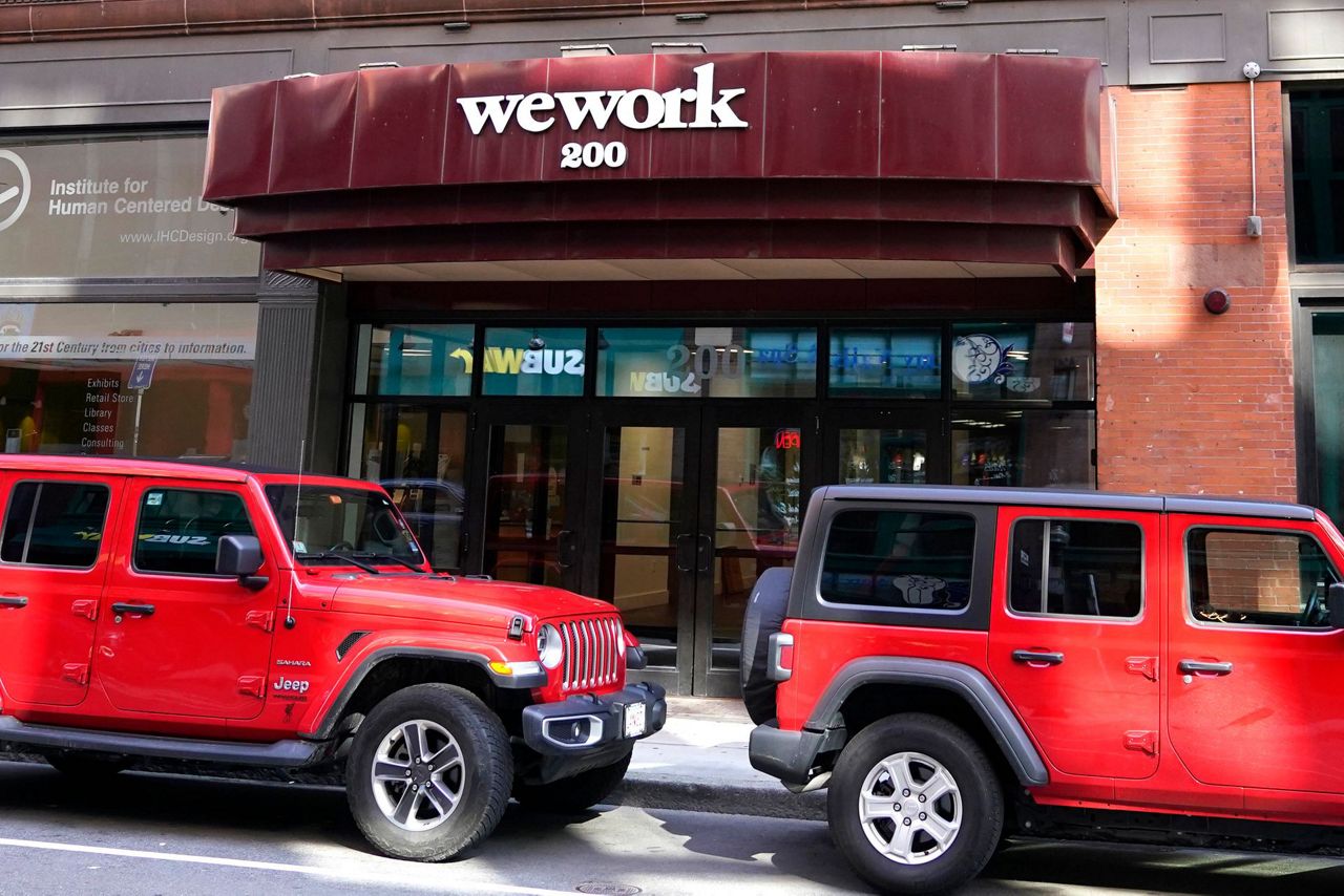 WeWork seeks bankruptcy protection, a stunning fall for a firm once ...