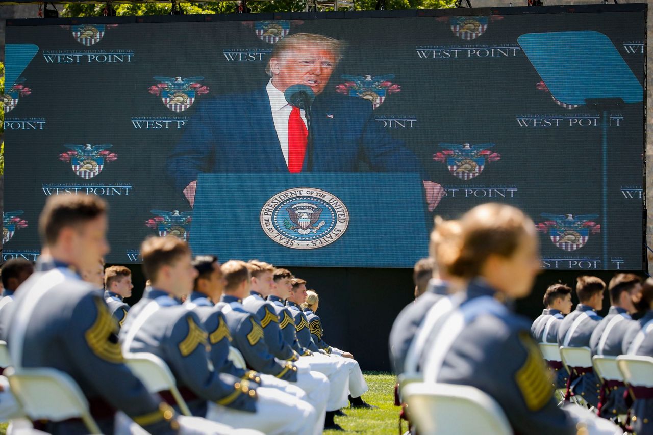 Trump addresses West Point grads amid tension with military