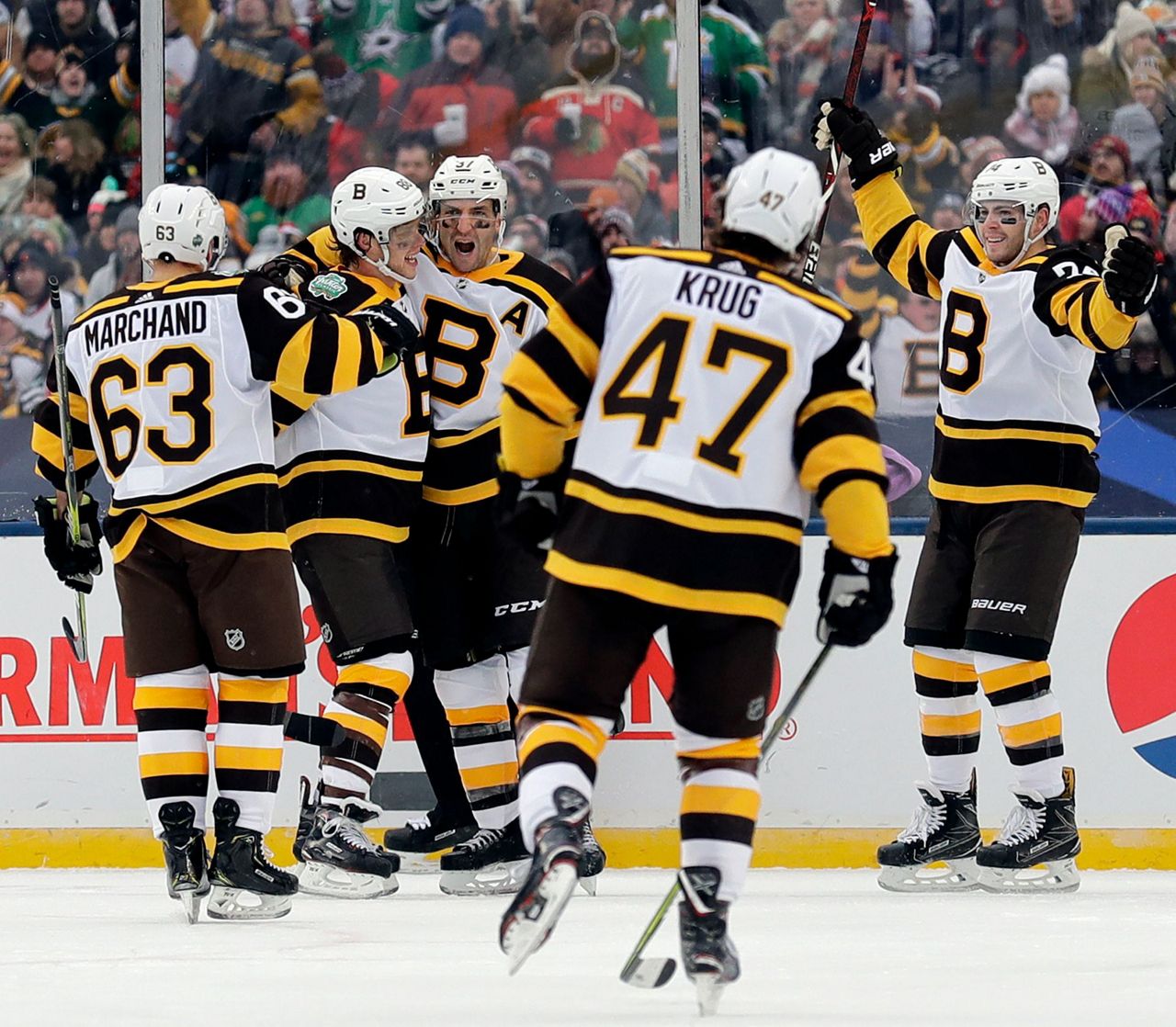 Pastrnak, Bruins beat Blackhawks 4-2 in Winter Classic