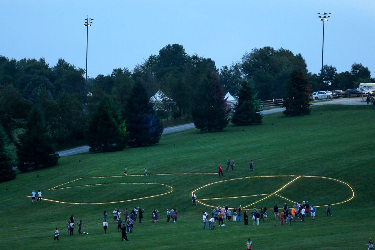 Groovy: Woodstock fans flock to concert site for anniversary