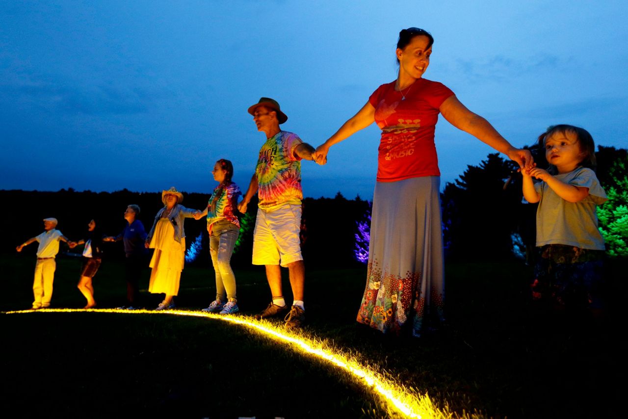 Groovy: Woodstock fans flock to concert site for anniversary