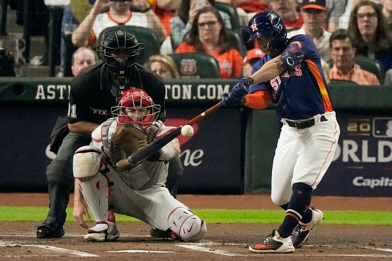 Altuve breaks out with 3 hits as Astros even World Series