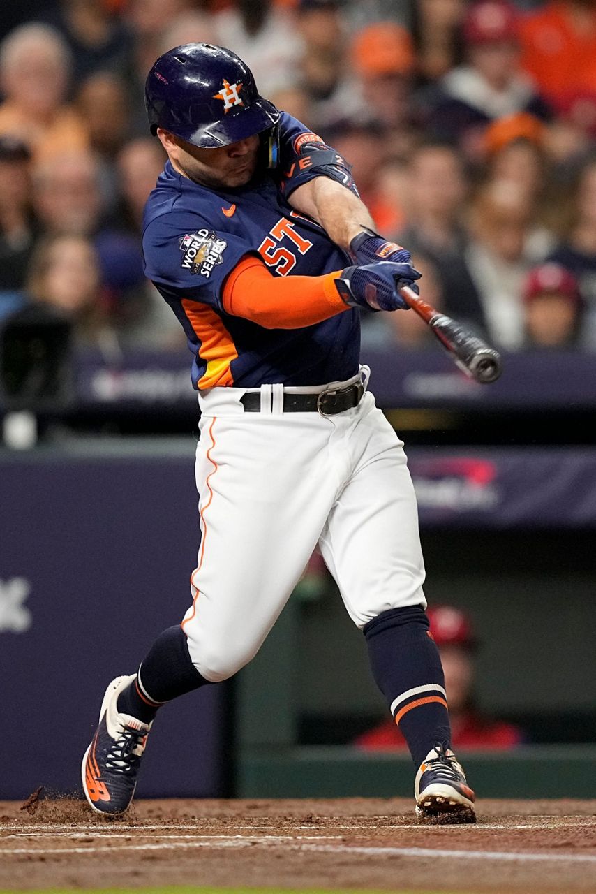 Altuve breaks out with 3 hits as Astros even World Series