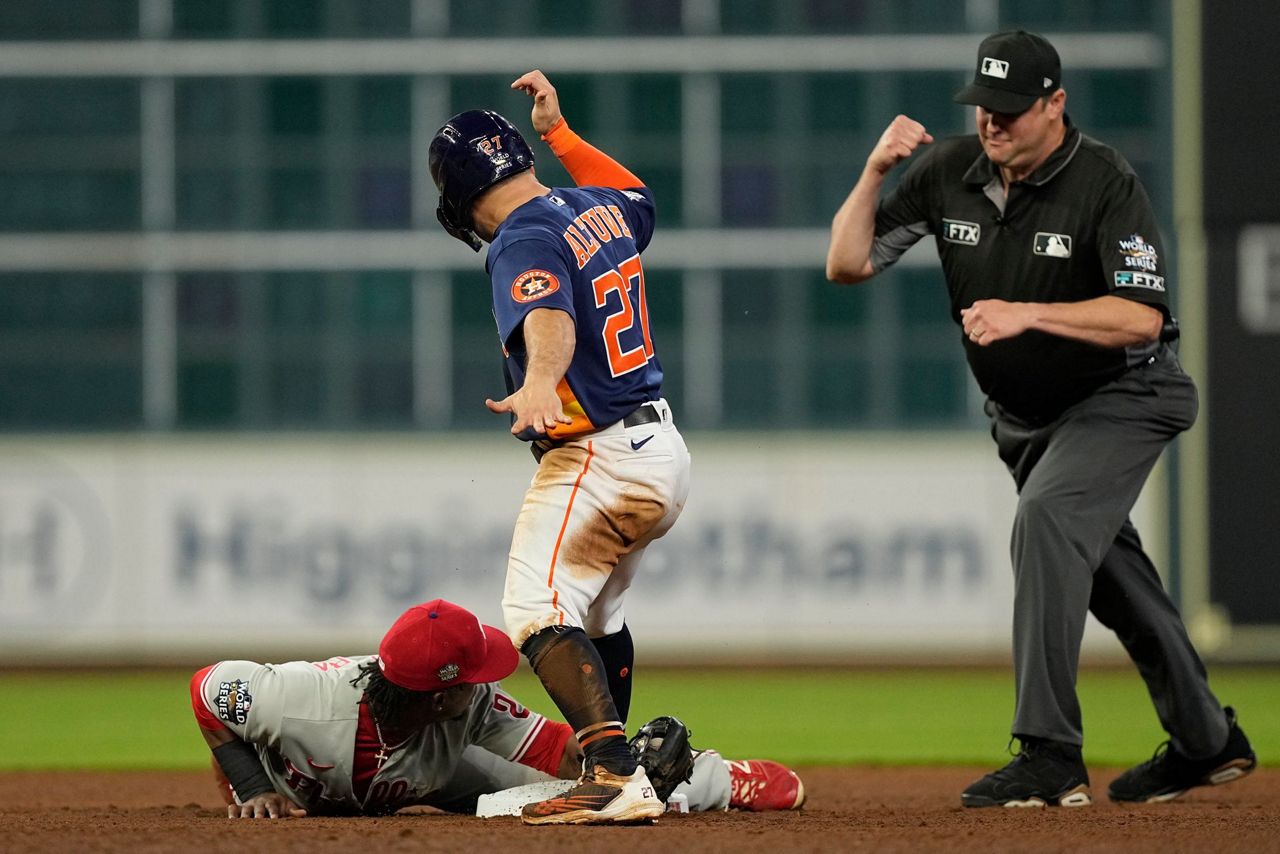 Altuve breaks out with 3 hits as Astros even World Series
