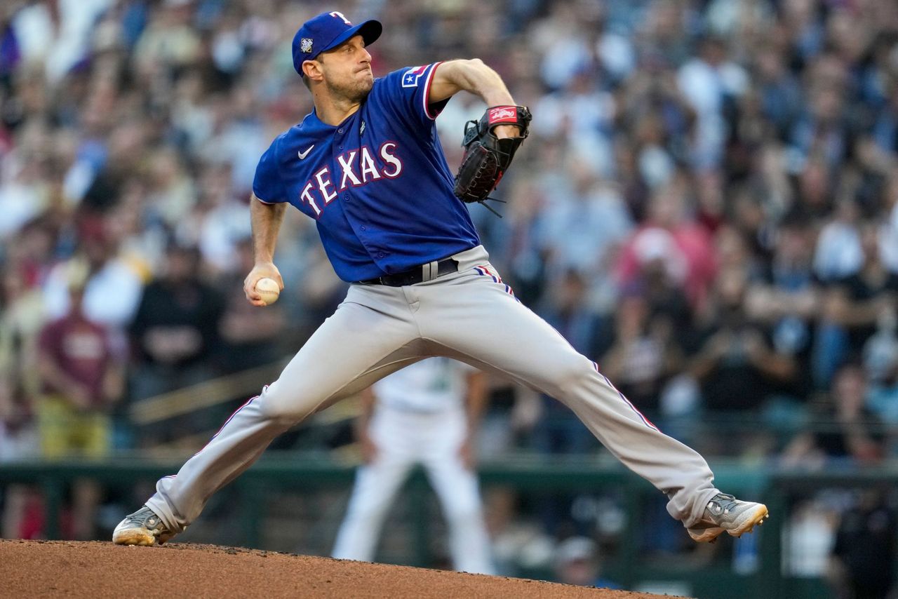 Rangers' Max Scherzer forced from World Series Game 3 by back tightness