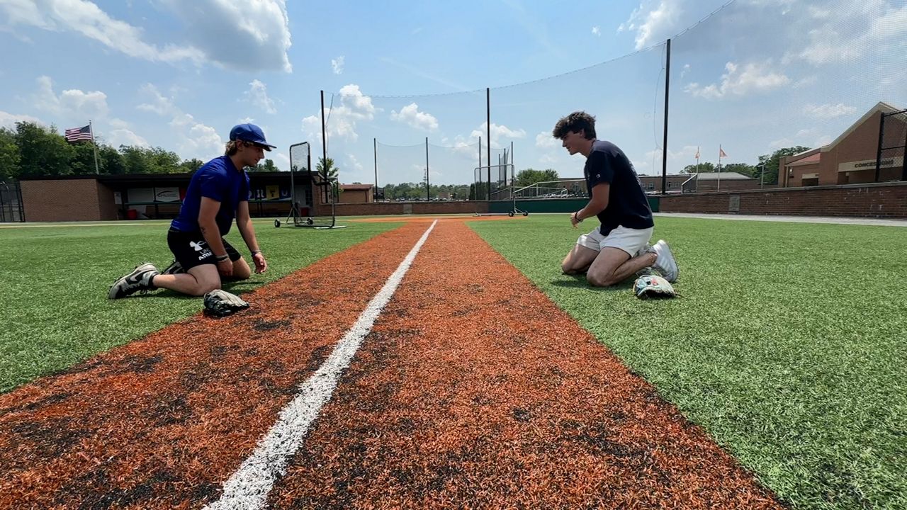Xavier baseball player teaching kids to love the game