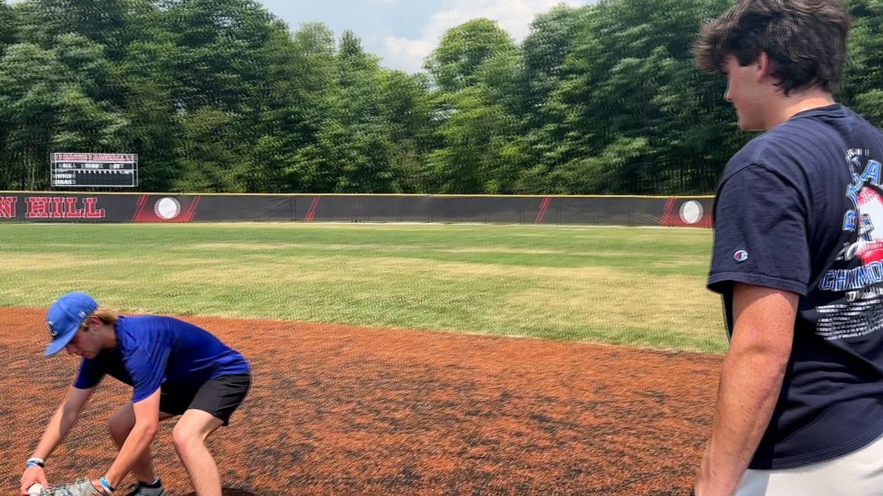 Xavier baseball player teaching kids to love the game