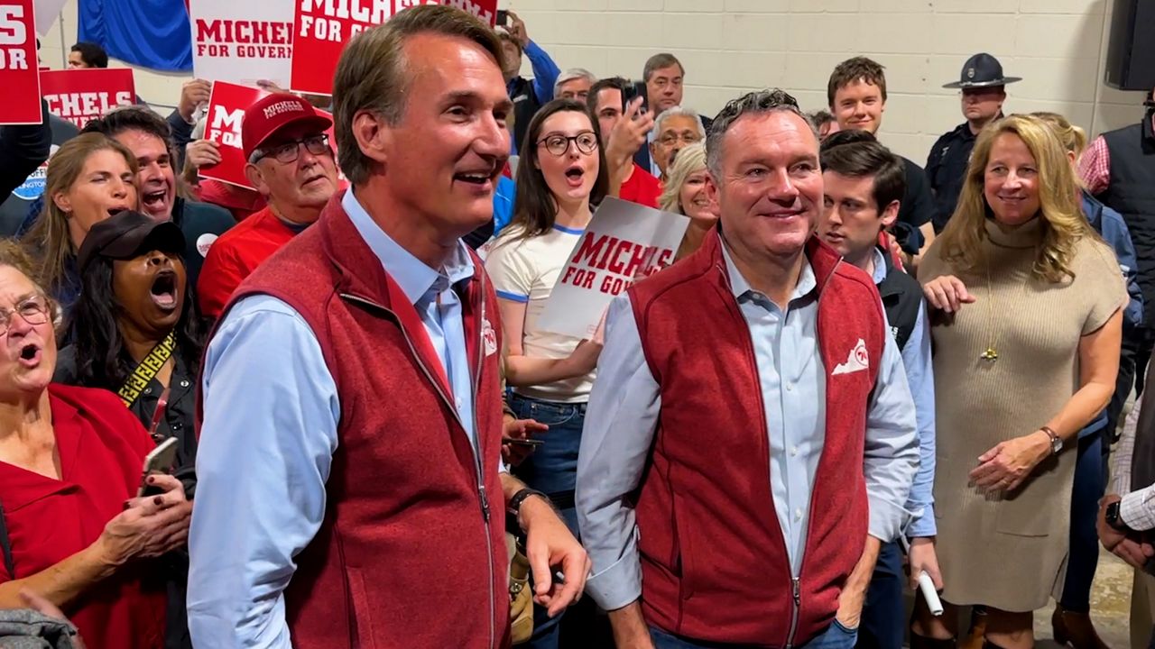 Virginia governor stumps for Tim Michels