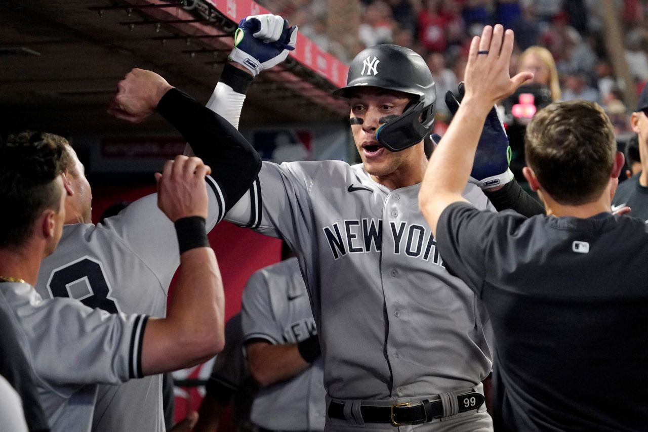 Judge hits 50th home run, becomes 10th player to do it twice