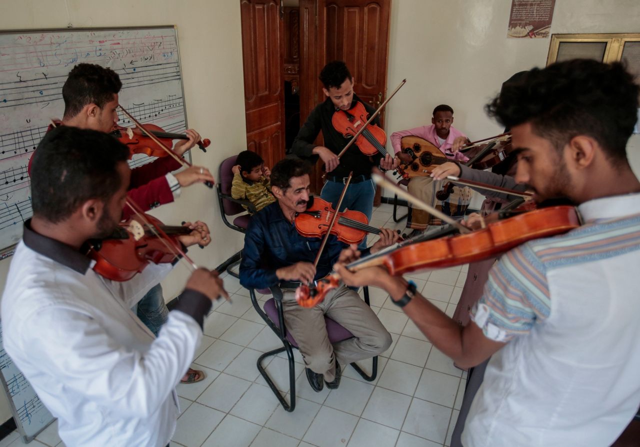 AP PHOTOS: In war-torn Yemen, music lessons offer refuge