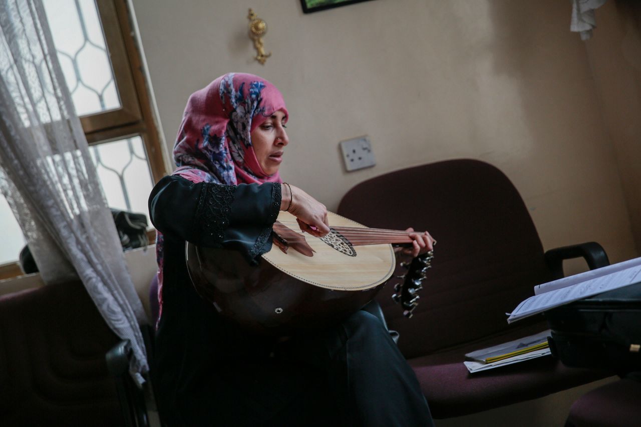 AP PHOTOS: In war-torn Yemen, music lessons offer refuge