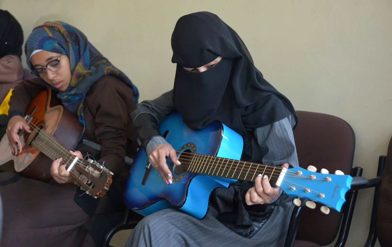 AP PHOTOS: In war-torn Yemen, music lessons offer refuge