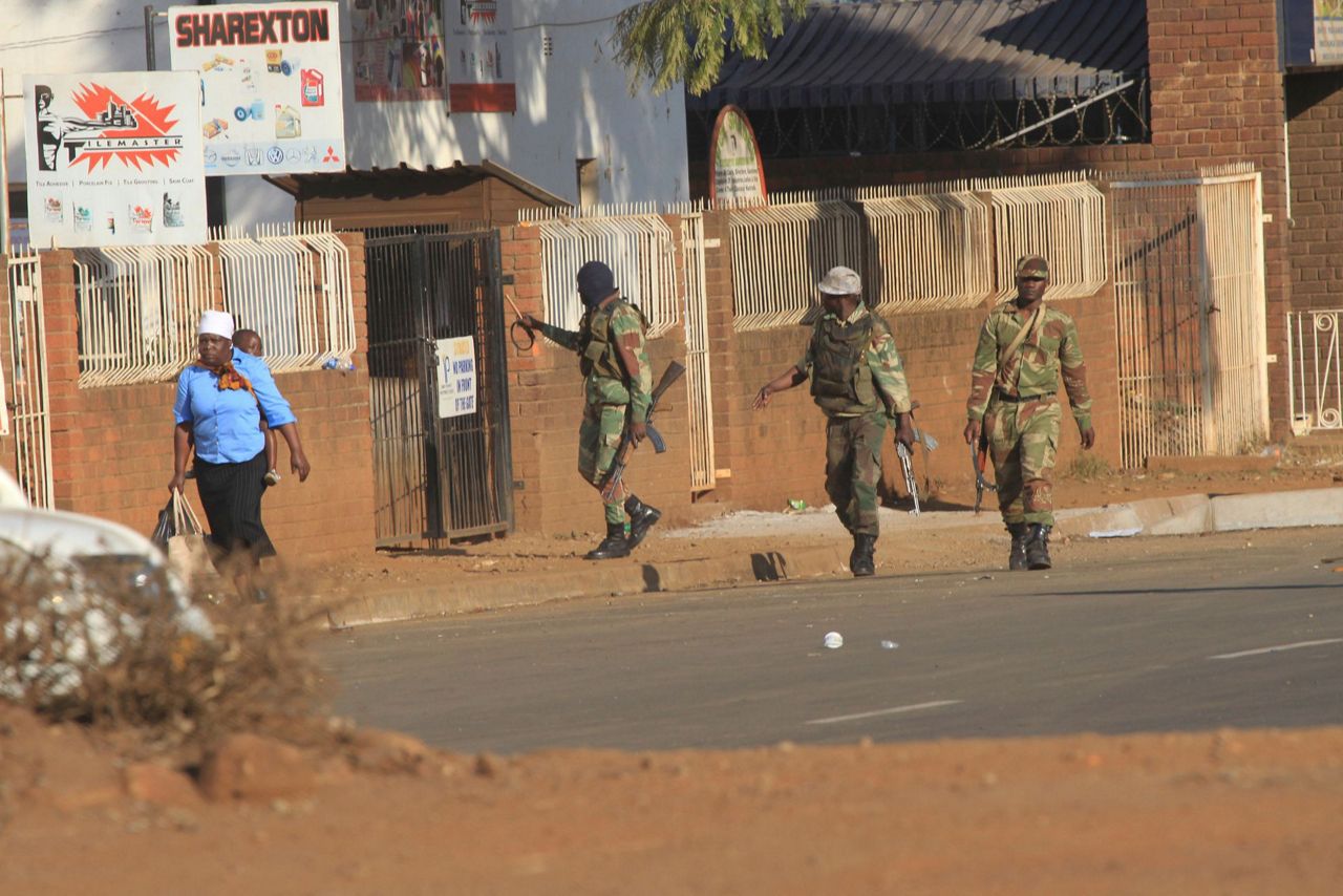 Zimbabwe inquiry says army, police responsible for killing 6