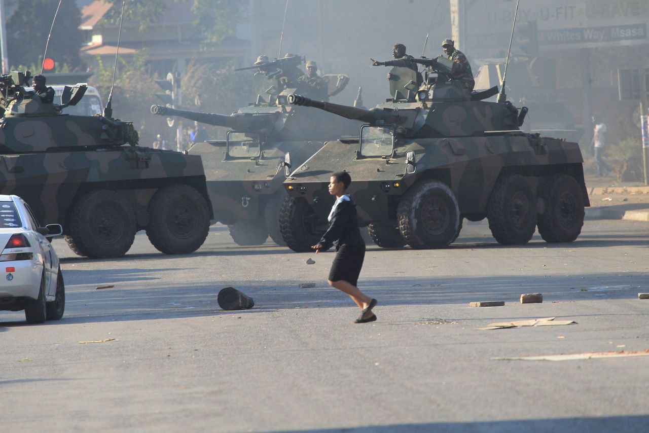 Zimbabwe inquiry says army, police responsible for killing 6
