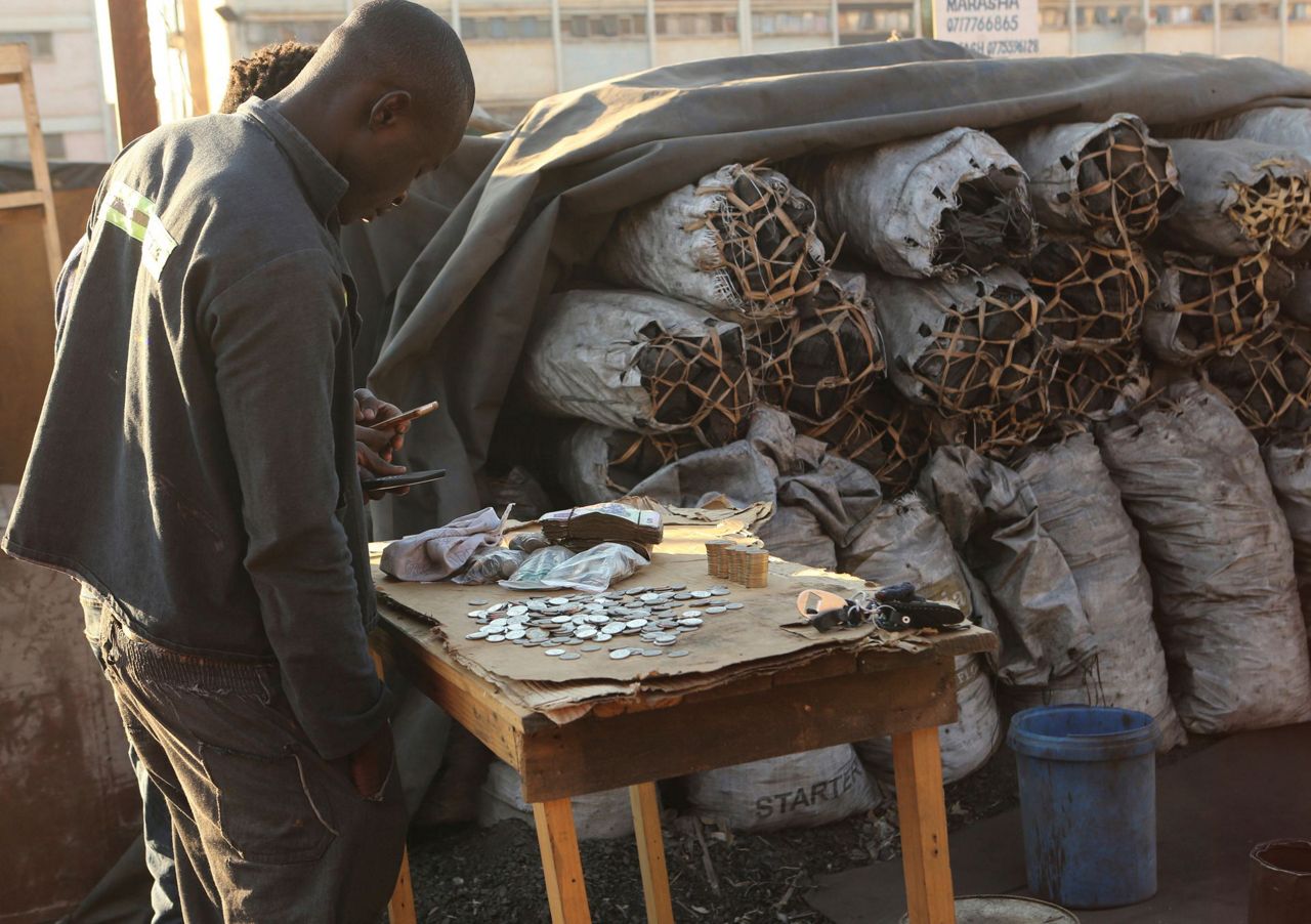 Desperate Zimbabweans use cell phone transfers to get cash