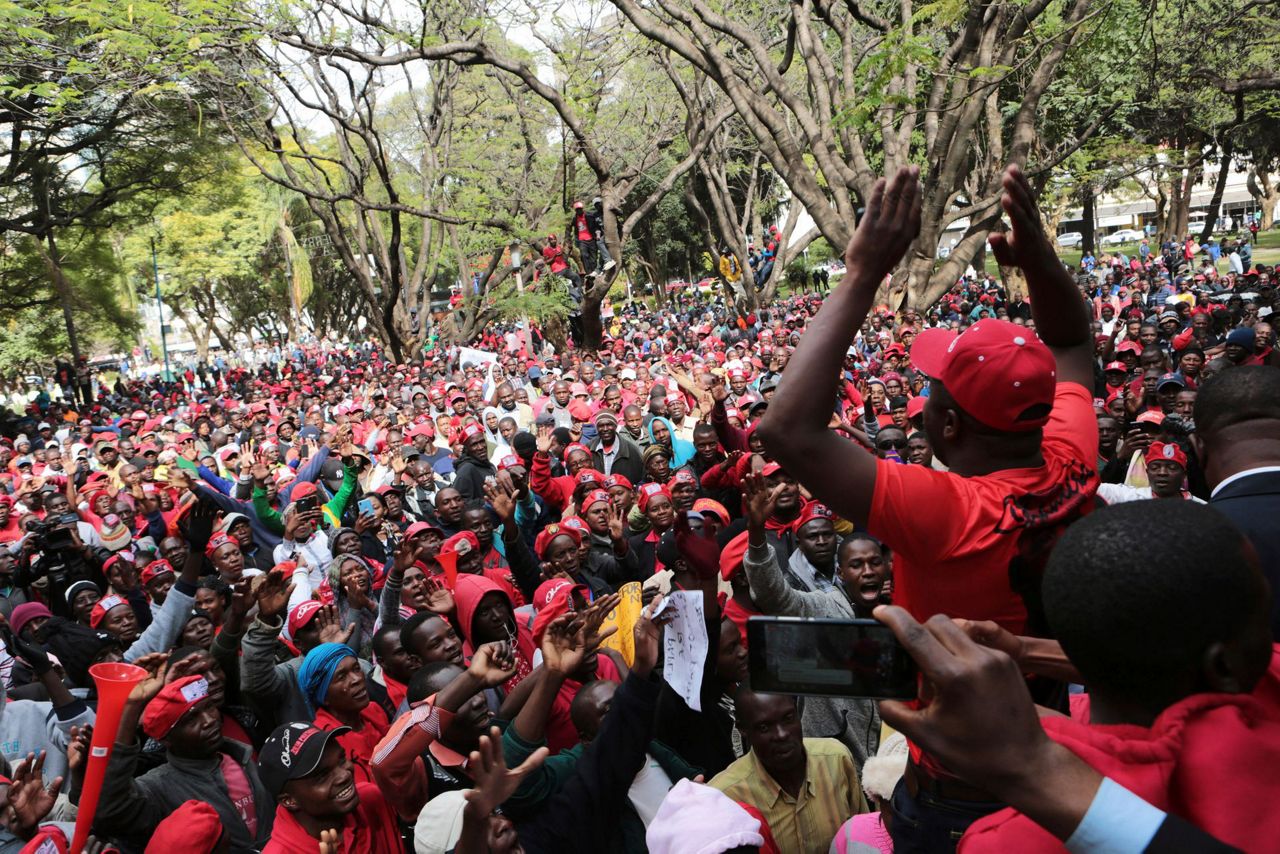 Zimbabwe's opposition marches in capital, seeking fair vote