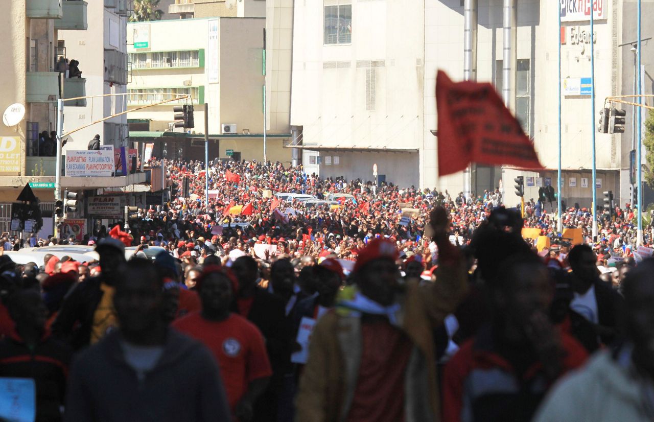 Zimbabwe's opposition marches in capital, seeking fair vote