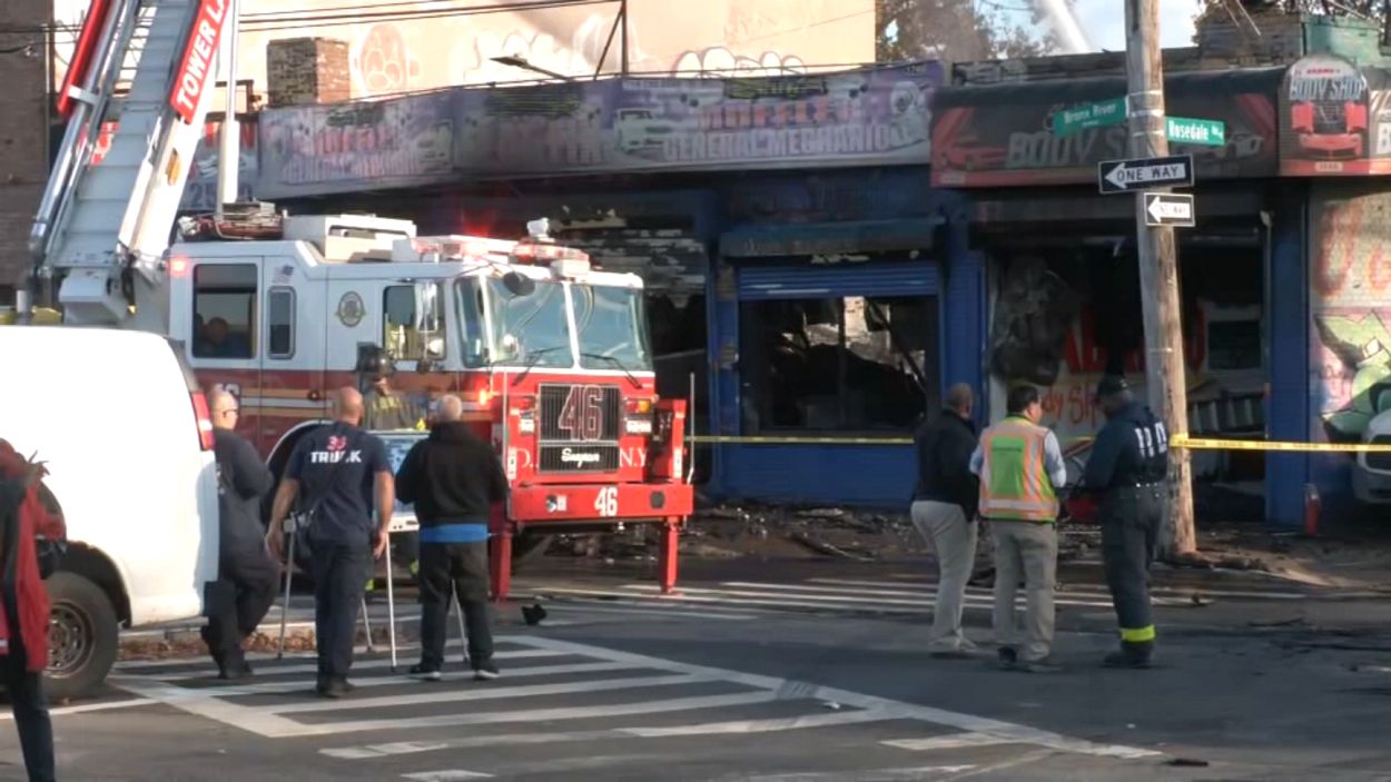 Bronx auto body shop fire displaces more than a dozen