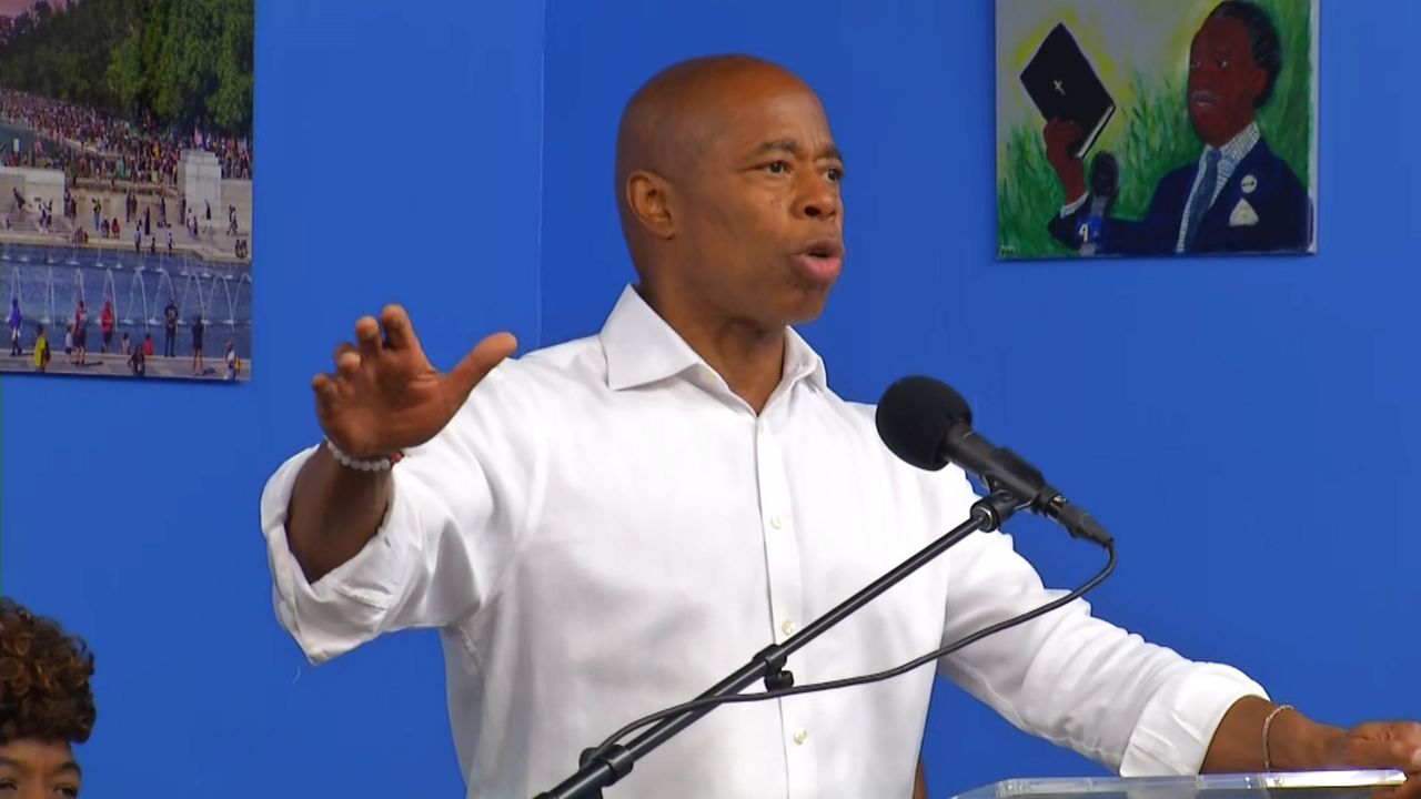 eric adams NAN al sharpton mayors race
