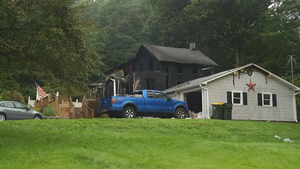 Family of seven escapes fire at New Baltimore home