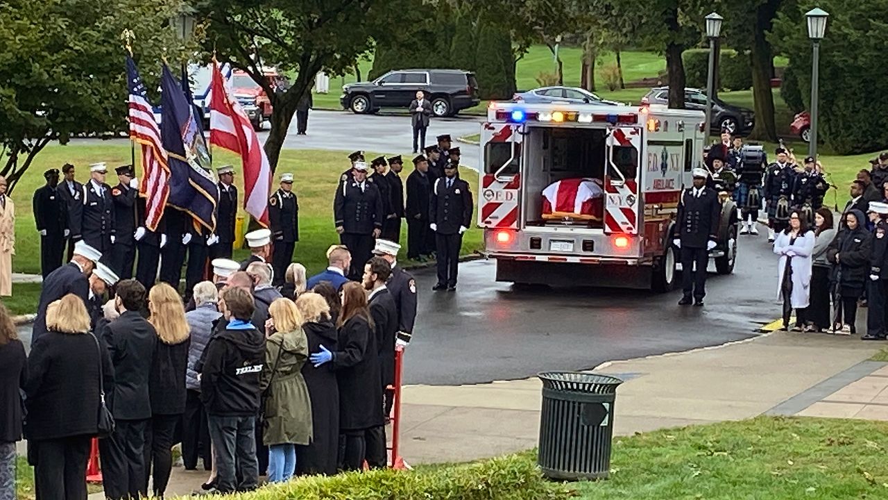 Mourners gather for funeral of slain EMS captain